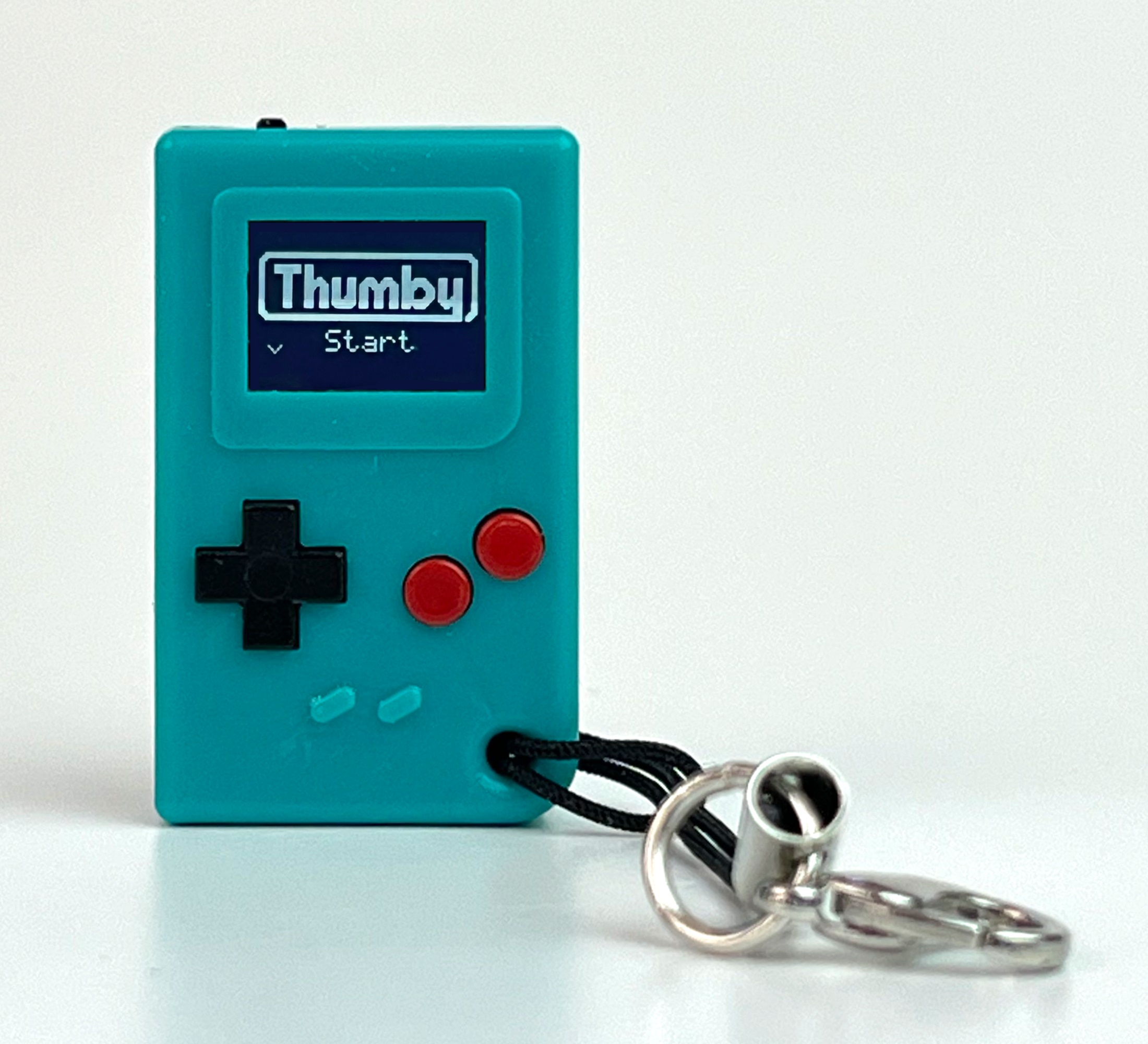 Thumby™ The Playable and Programmable Keychain, Teal – Oz Robotics