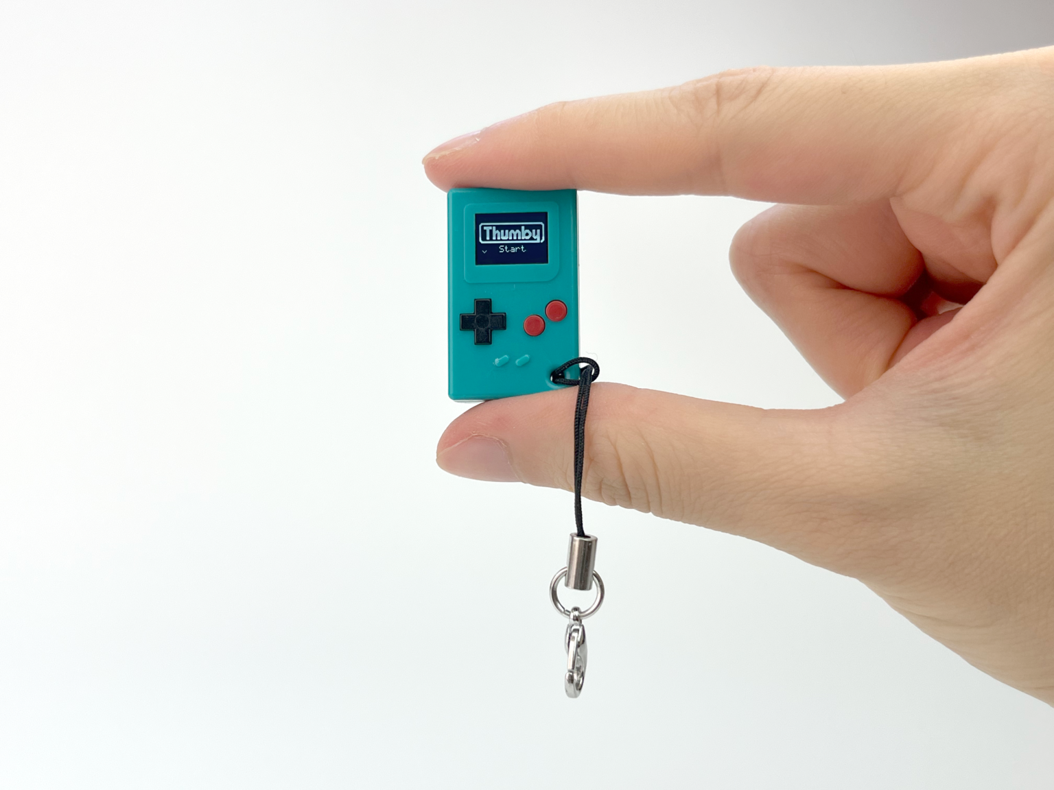 Thumby The Playable and Programmable Keychain, Teal – Oz Robotics