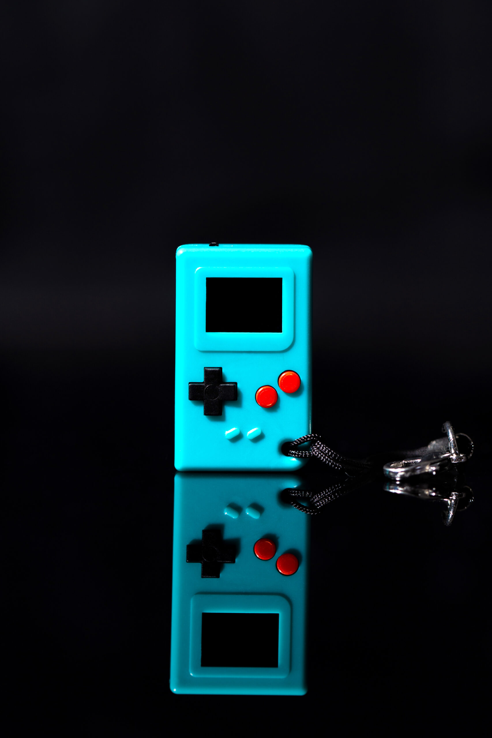 Thumby™ The Playable and Programmable Keychain, Teal – Oz Robotics